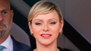 Charlene of Monaco in a Green Jumpsuit by Louis Vuitton