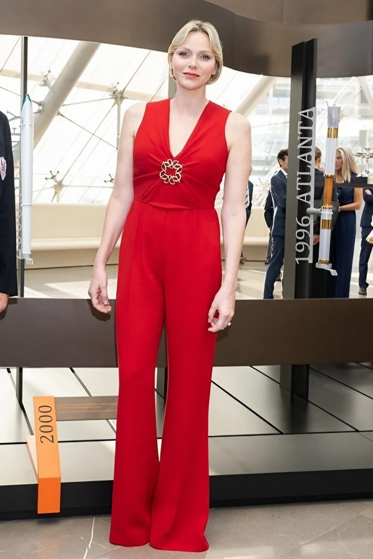 Princess Charlene of Monaco in a Red Jumpsuit by Elie Saab