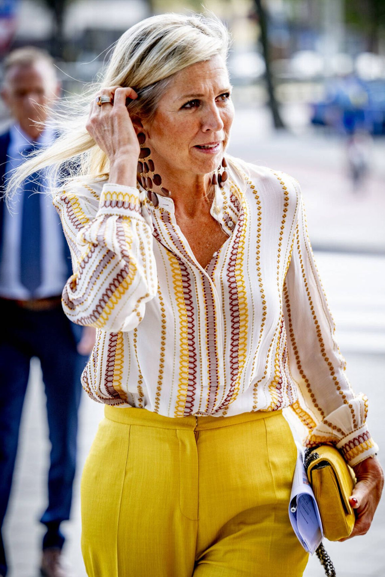 Queen Maxima in Yellow Palazzo Pants and Embroidered Top