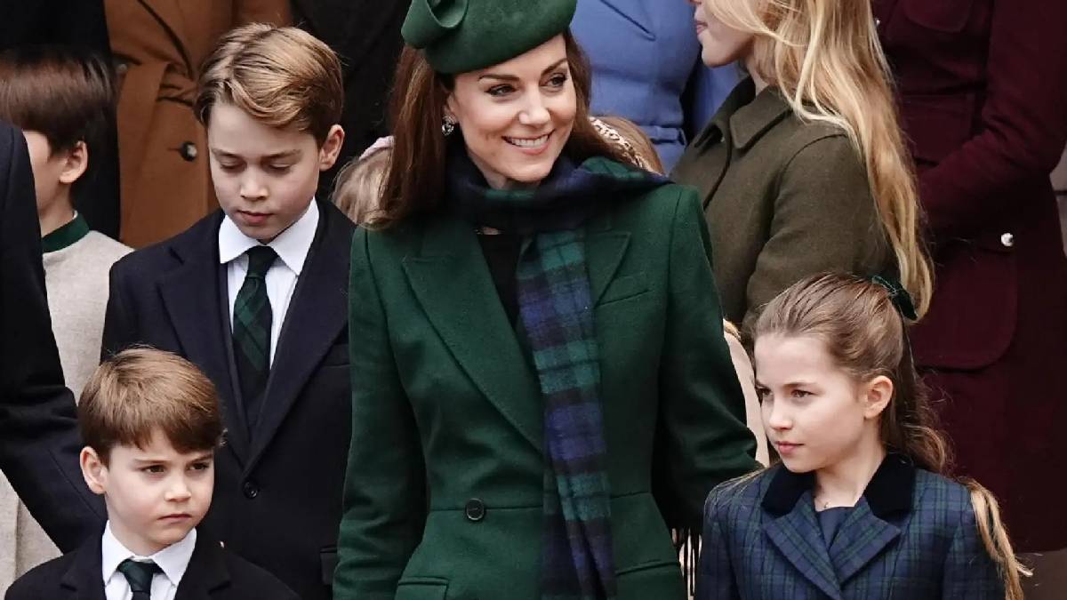 What is Kate doing with George Charlotte and Louis' clothes?