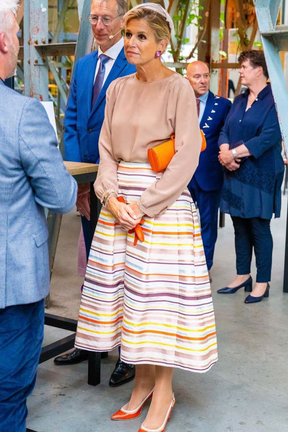 Work Outfits Ideas For Women: Colorful Striped Skirt & Statement Heels