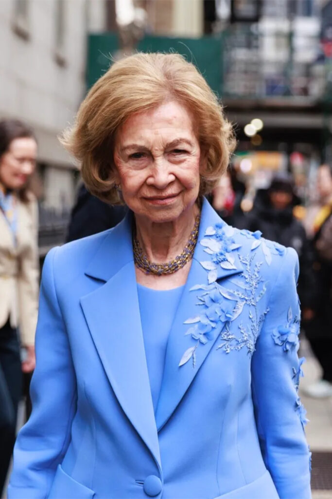 Queen Sofia Shines in Blue Suit and Pink Coat in New York